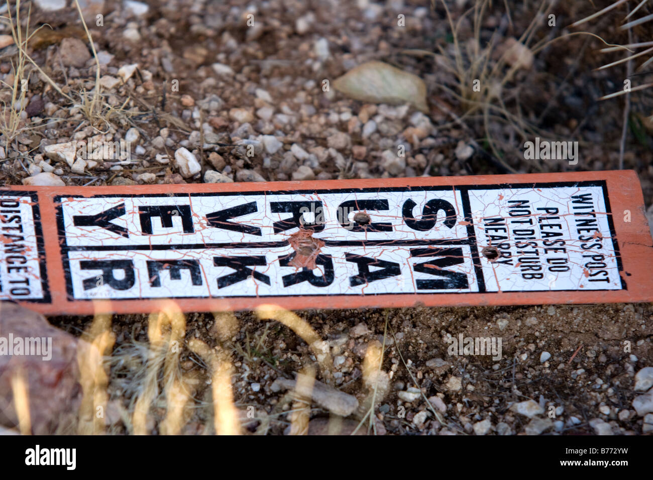 Plastic survey marker with bullet holes Stock Photo - Alamy