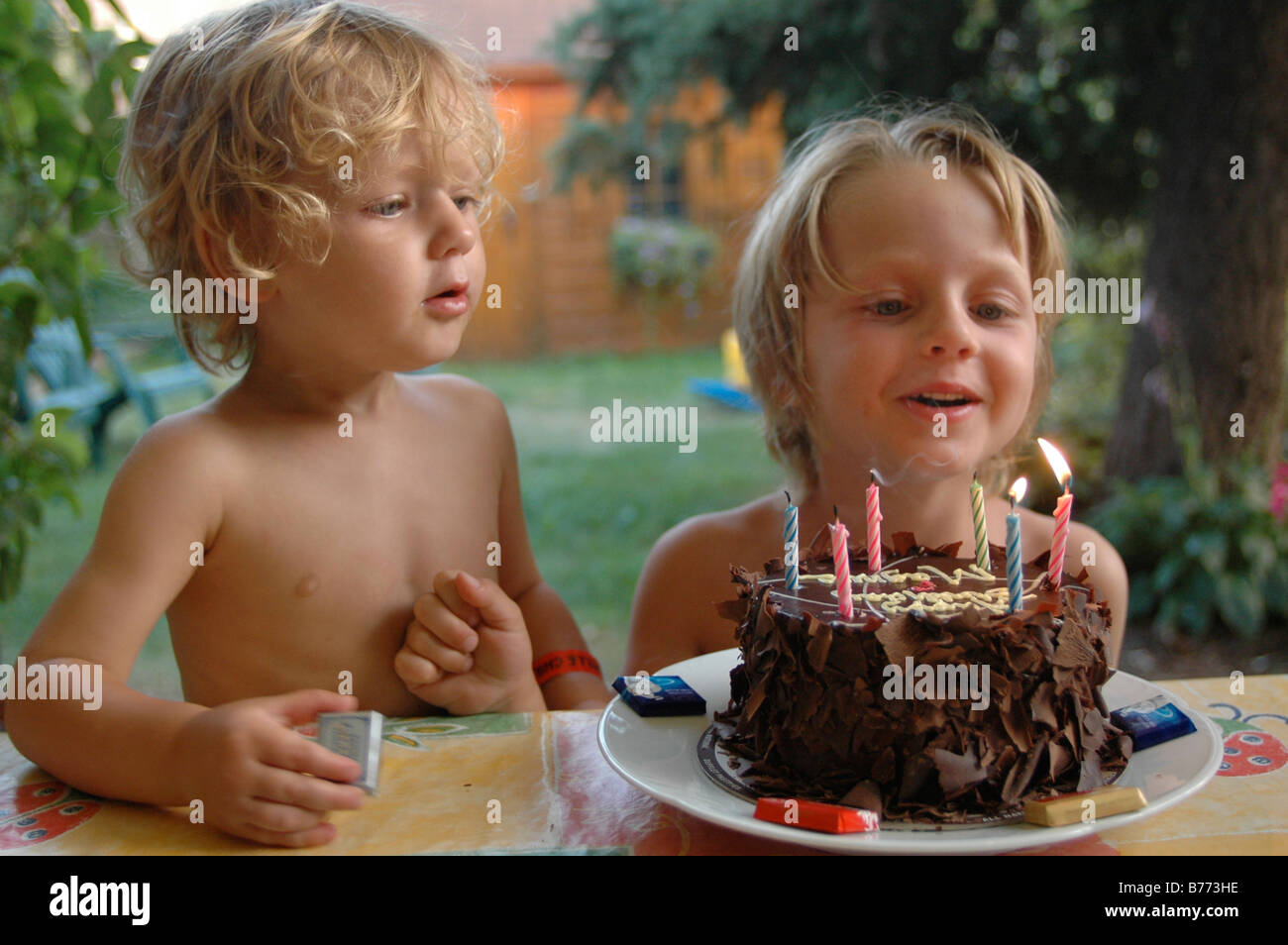 Birthday cake blue candles hi-res stock photography and images - Alamy