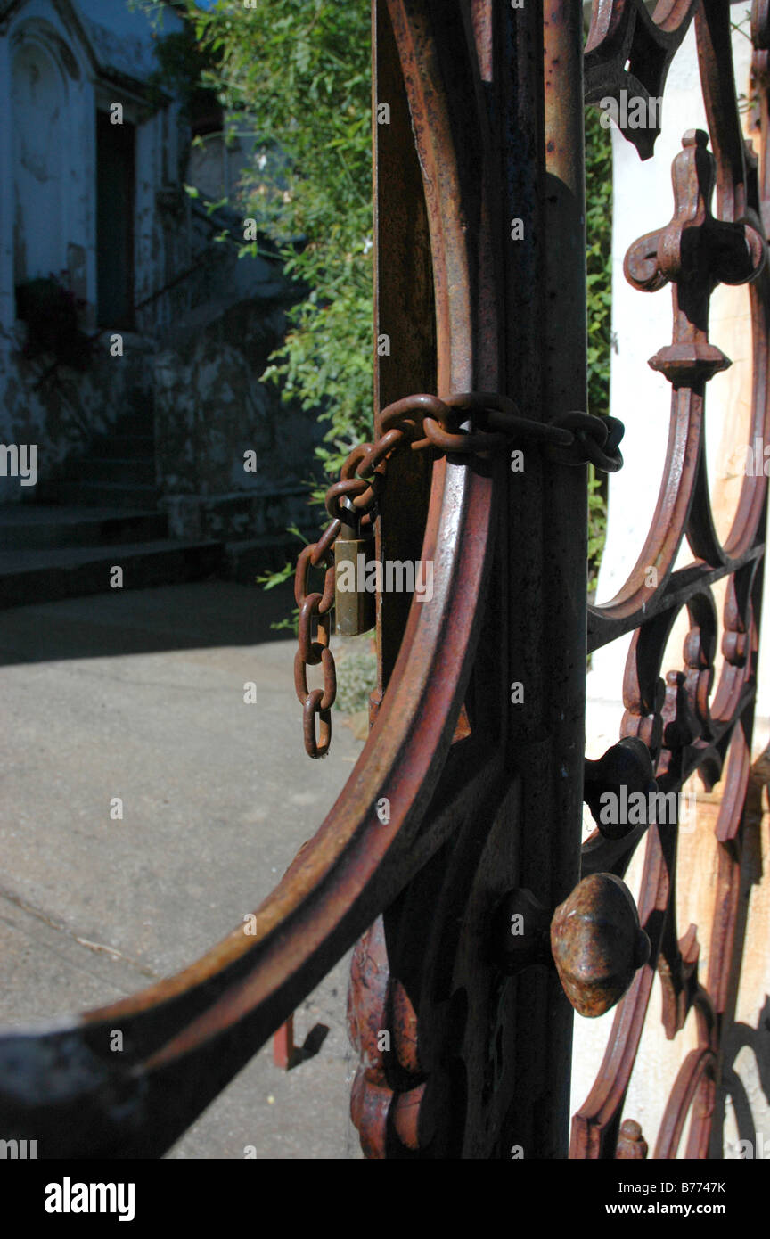 A locked gate in to a courtyard in Tasmania Stock Photo - Alamy