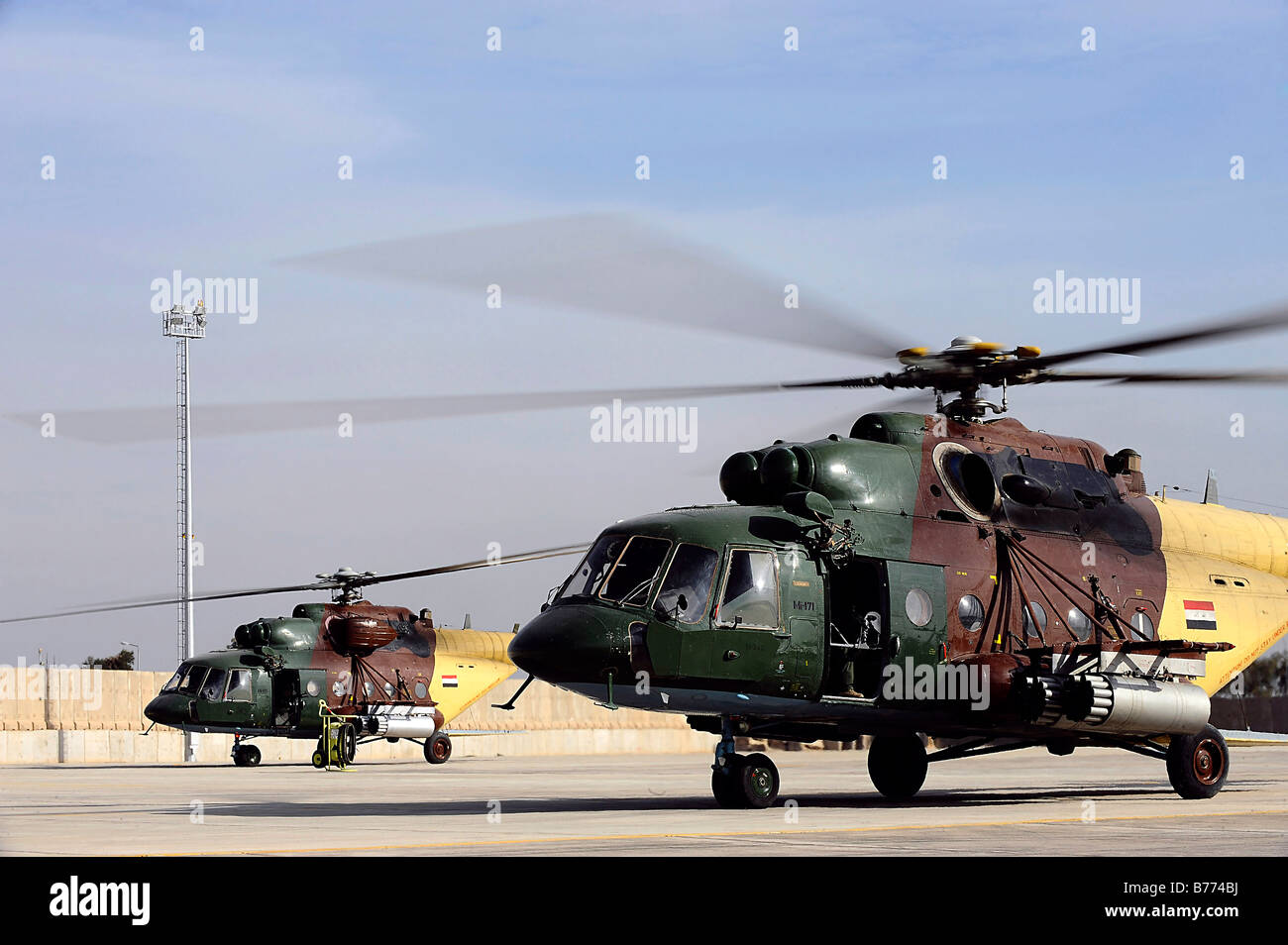 Two Iraqi Mi-17 Hip Helicopters conduct an aeromedical evacuation ...