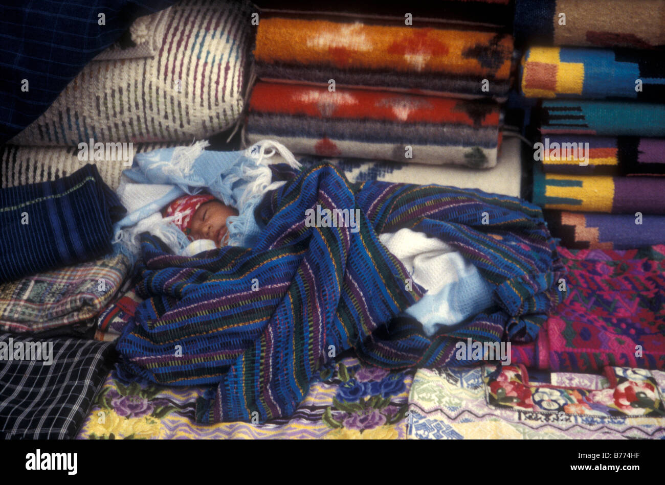Mayan baby sleeping in the Spanish colonial town of Antigua, Guatemala ...