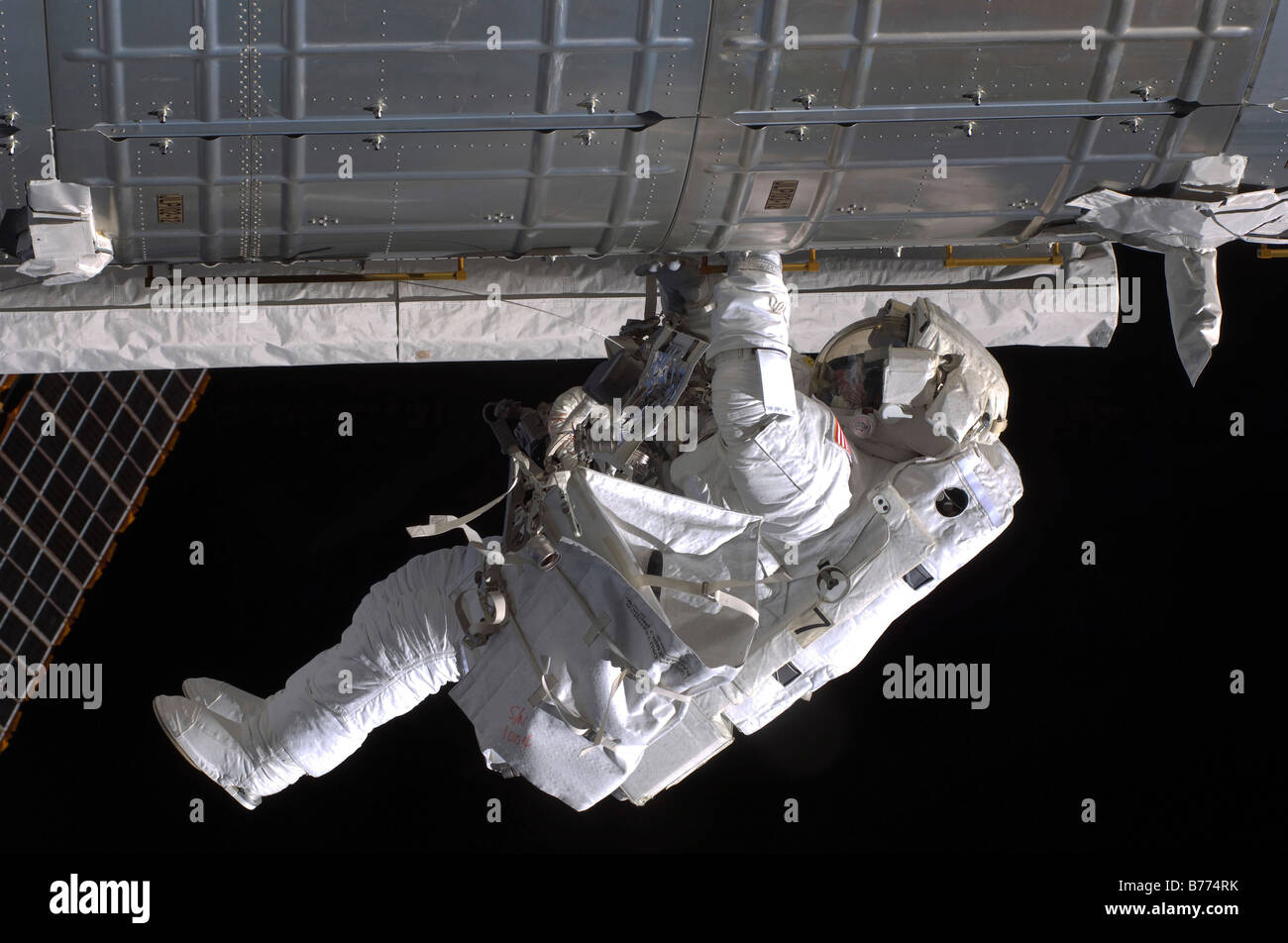 Astronaut participates in extravehicular activity Stock Photo - Alamy