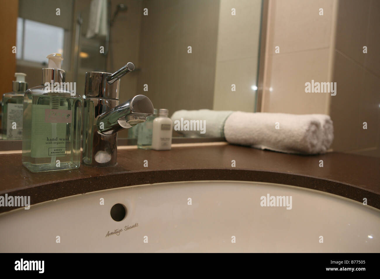 a interior photograph of a sink in a bathroom in a exclusive hotel in ...