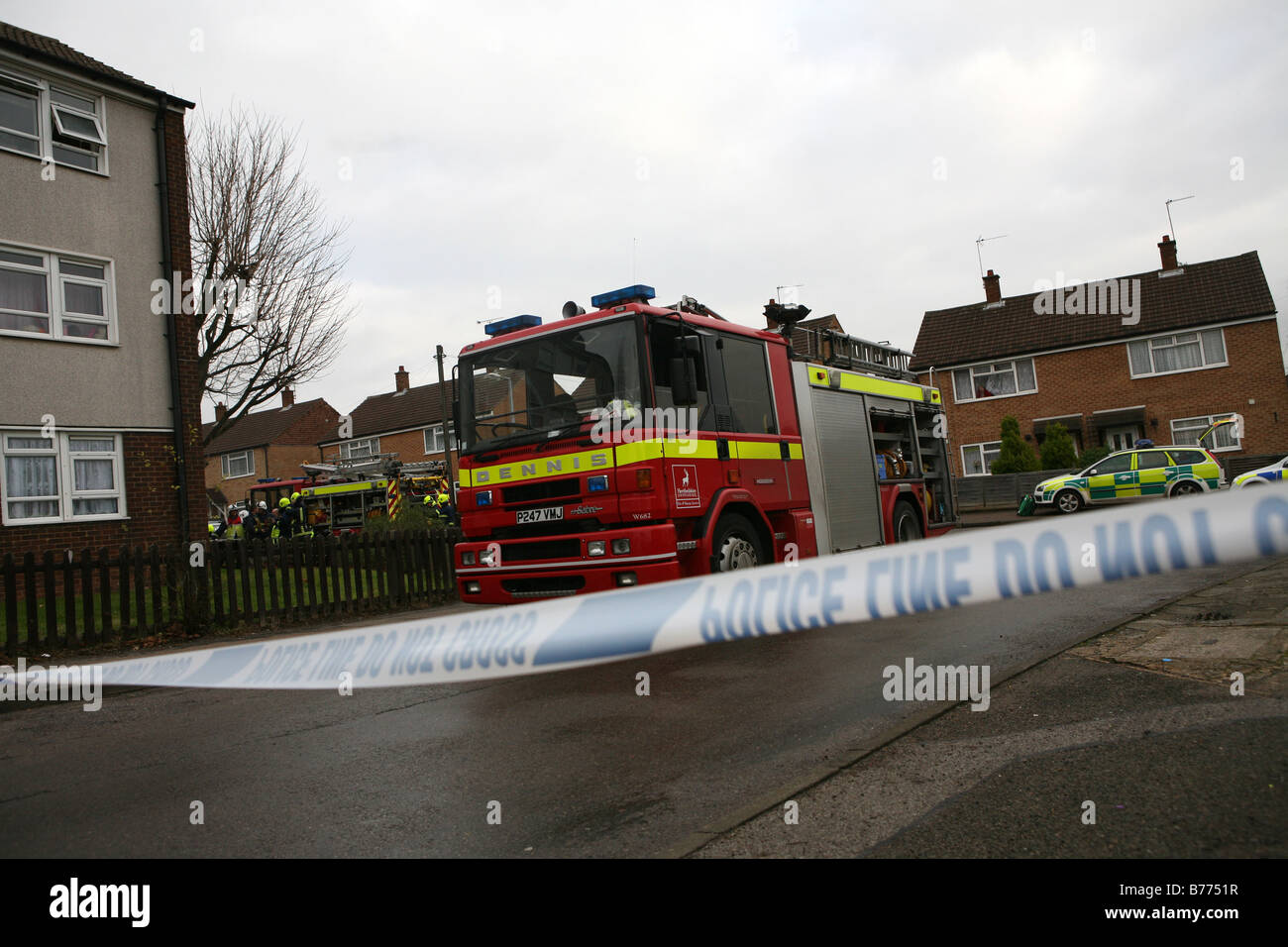 fireman fighting a fire in a block of flats in hertfordshire uk Stock ...
