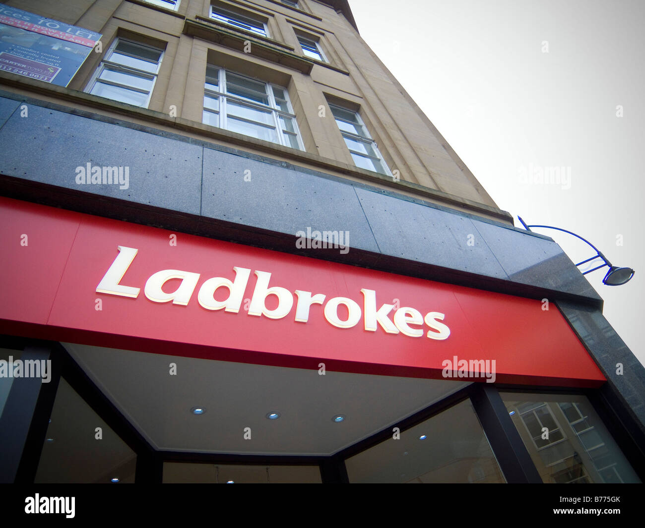 The frontage of a Ladbrokes betting shop Stock Photo - Alamy