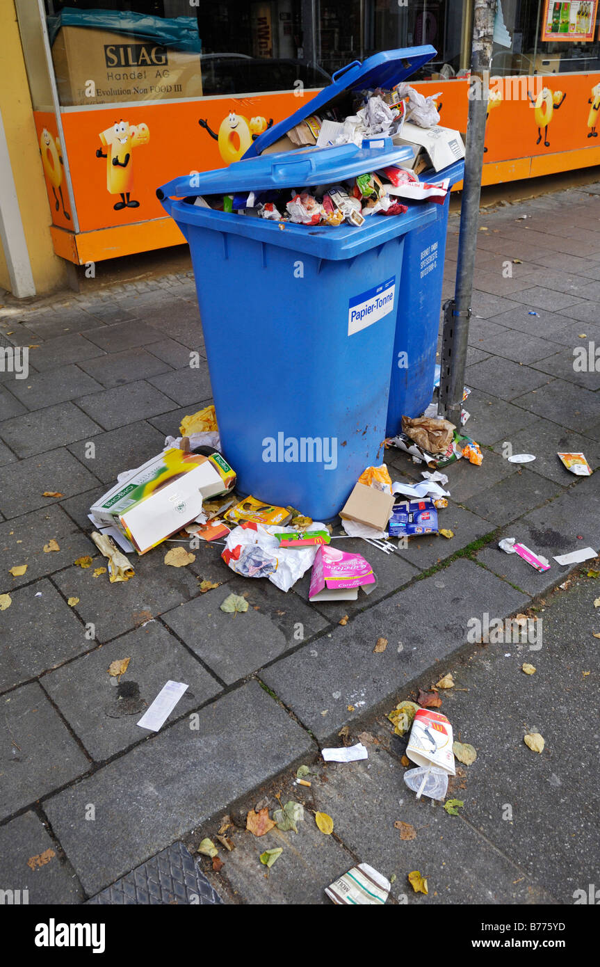 Overflowing dustbin hi-res stock photography and images - Alamy