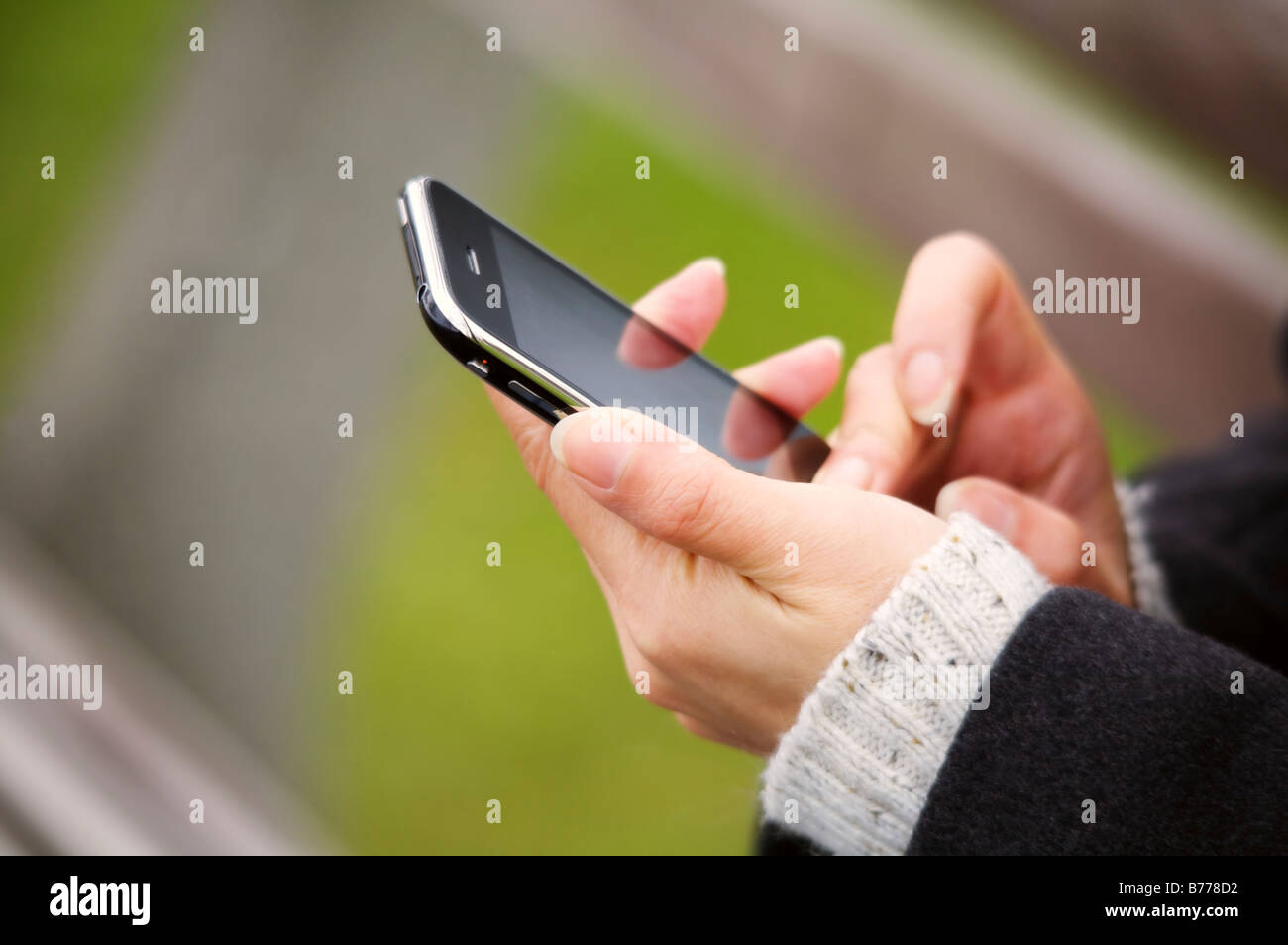 Man hand holding iPhone showing iPhone application Stock Photo - Alamy