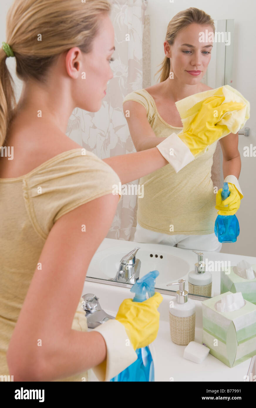 Woman wiping mirror housework hi-res stock photography and images - Alamy