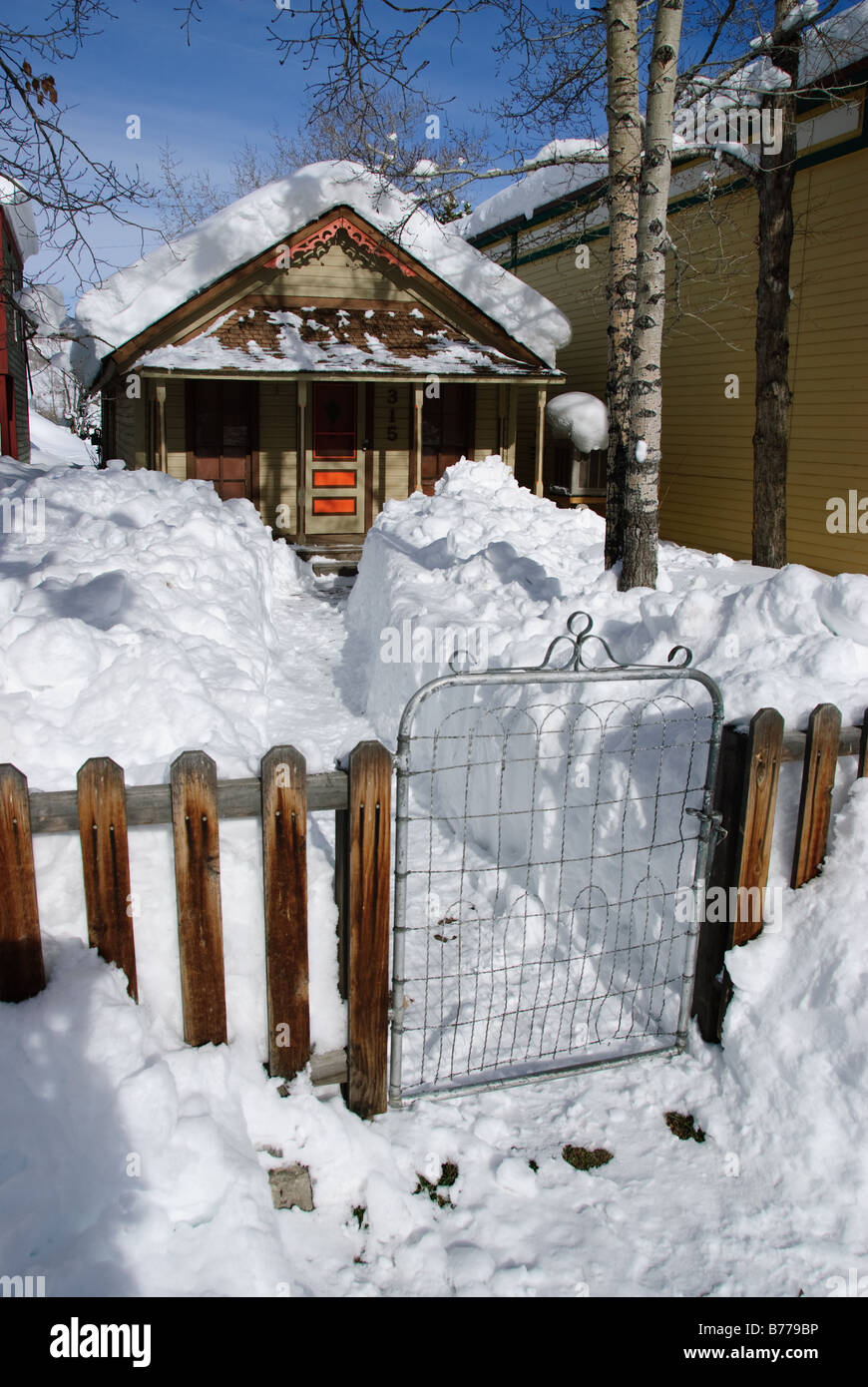 Home with a trench in the snow Stock Photo - Alamy