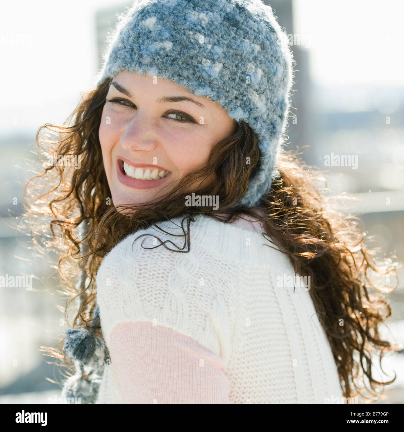 Portrait of woman smiling stocking cap Stock Photo - Alamy