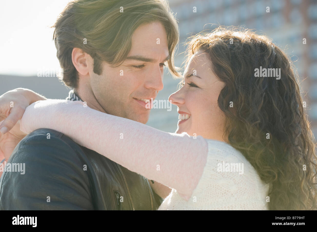 Close up of couple hugging Stock Photo - Alamy