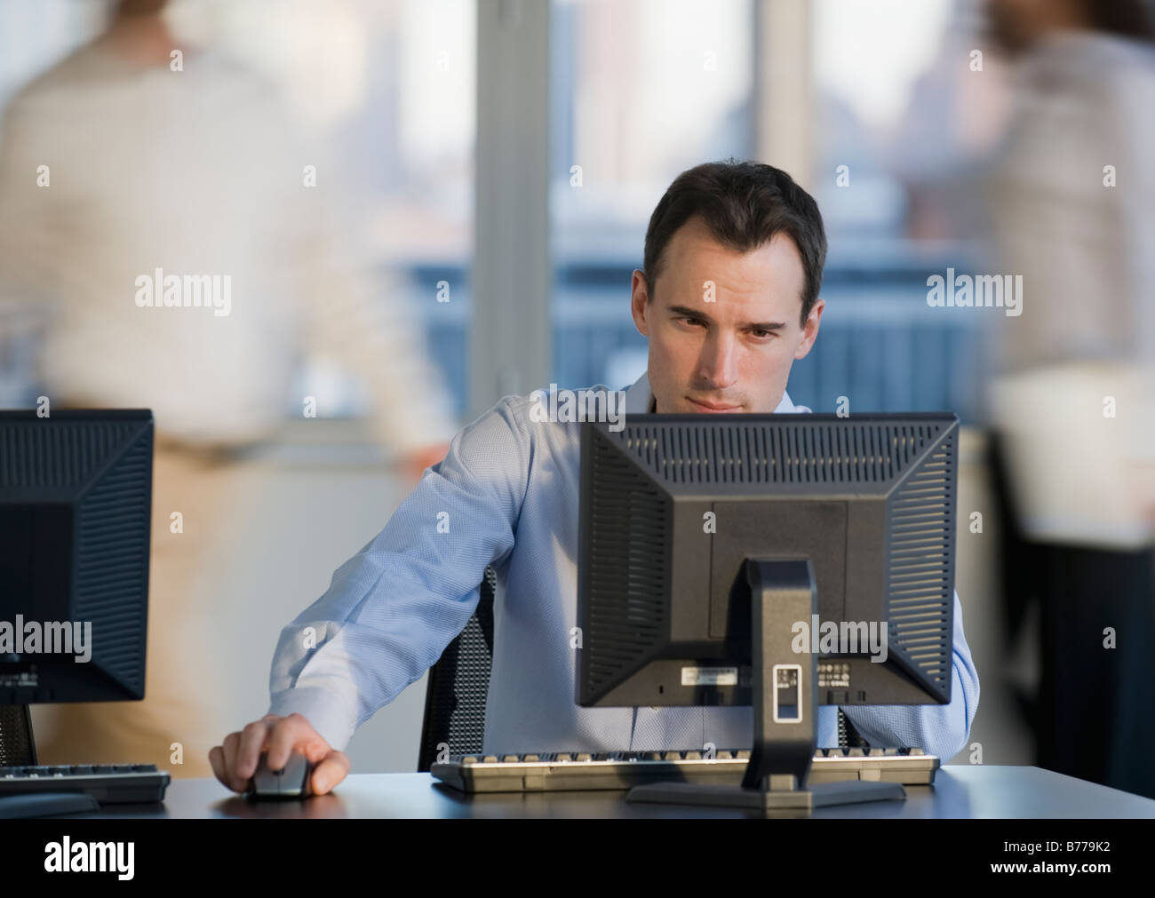 Man sitting down office movement hi-res stock photography and images ...