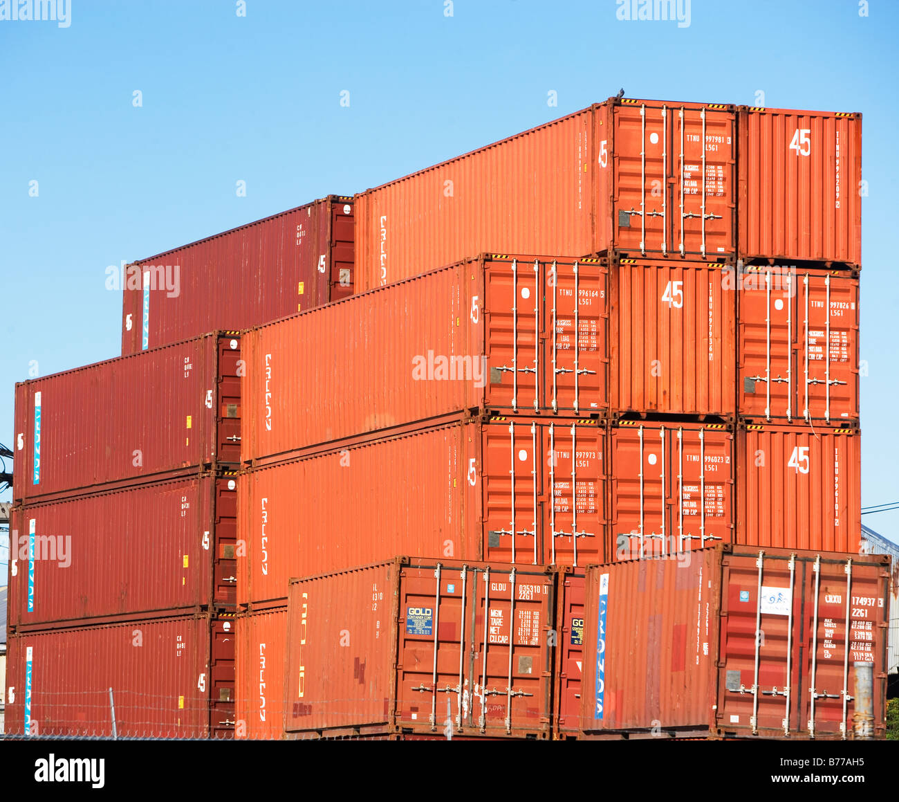 Stacked cargo containers Stock Photo - Alamy