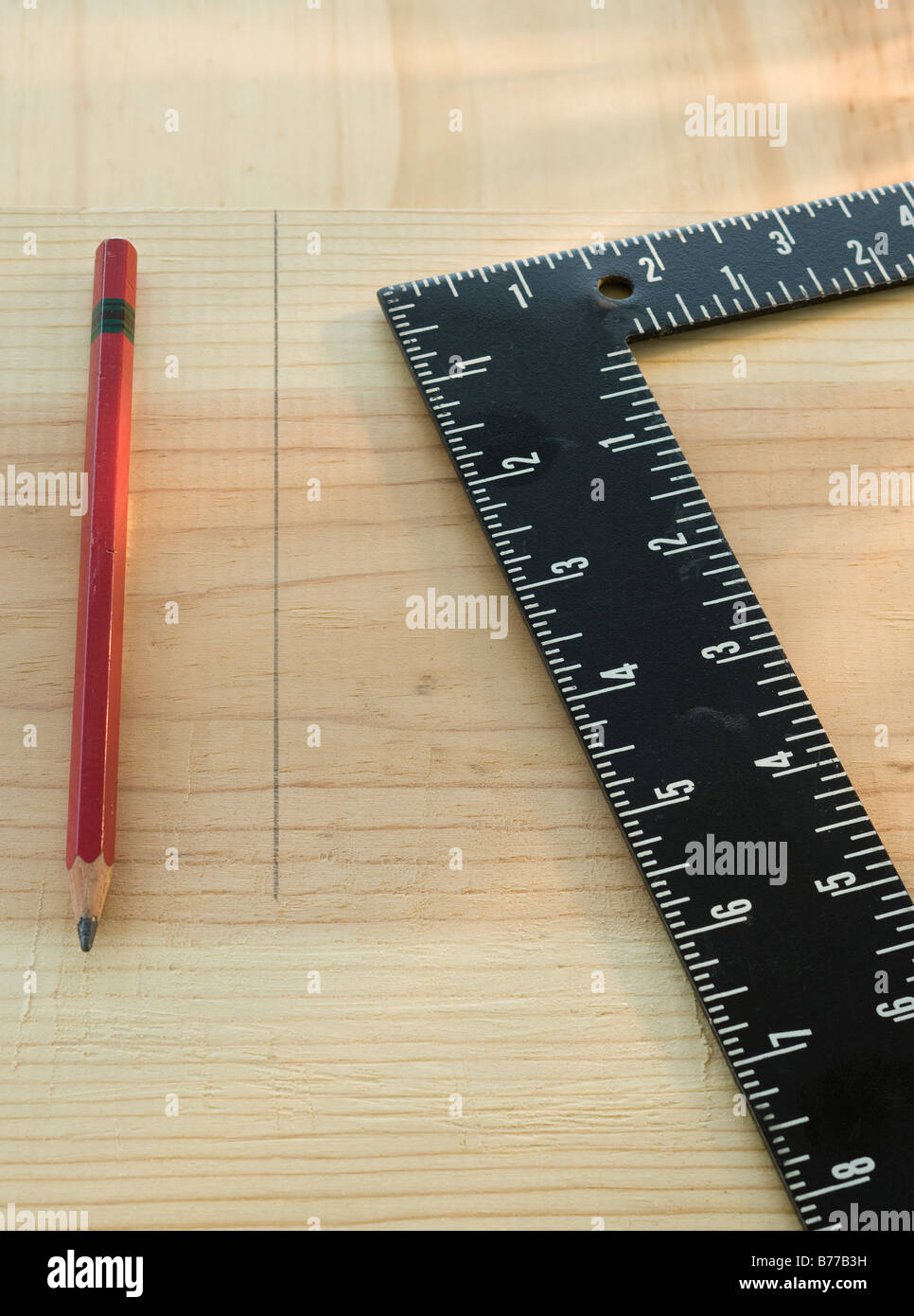 Pencil and carpenter’s rule on wood plank Stock Photo - Alamy