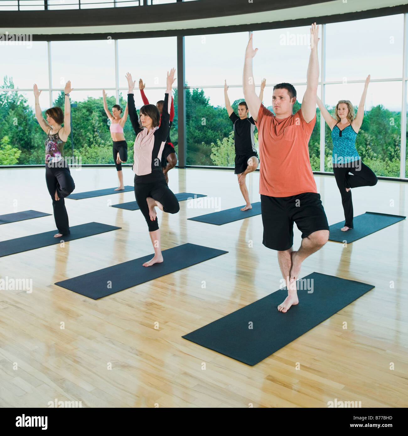 Yoga class mountain pose Stock Photo - Alamy