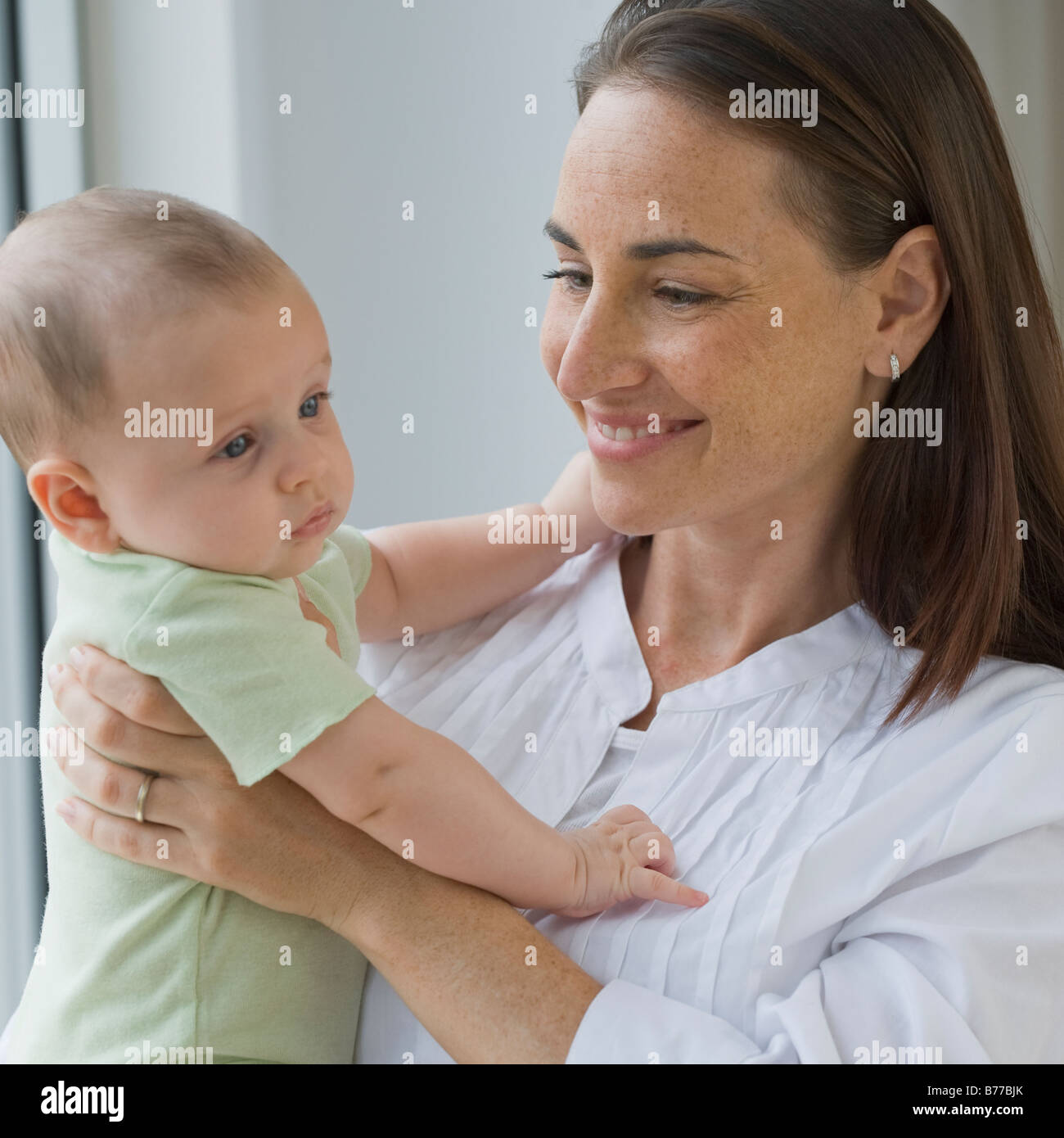 One mother baby hold head hi-res stock photography and images - Alamy