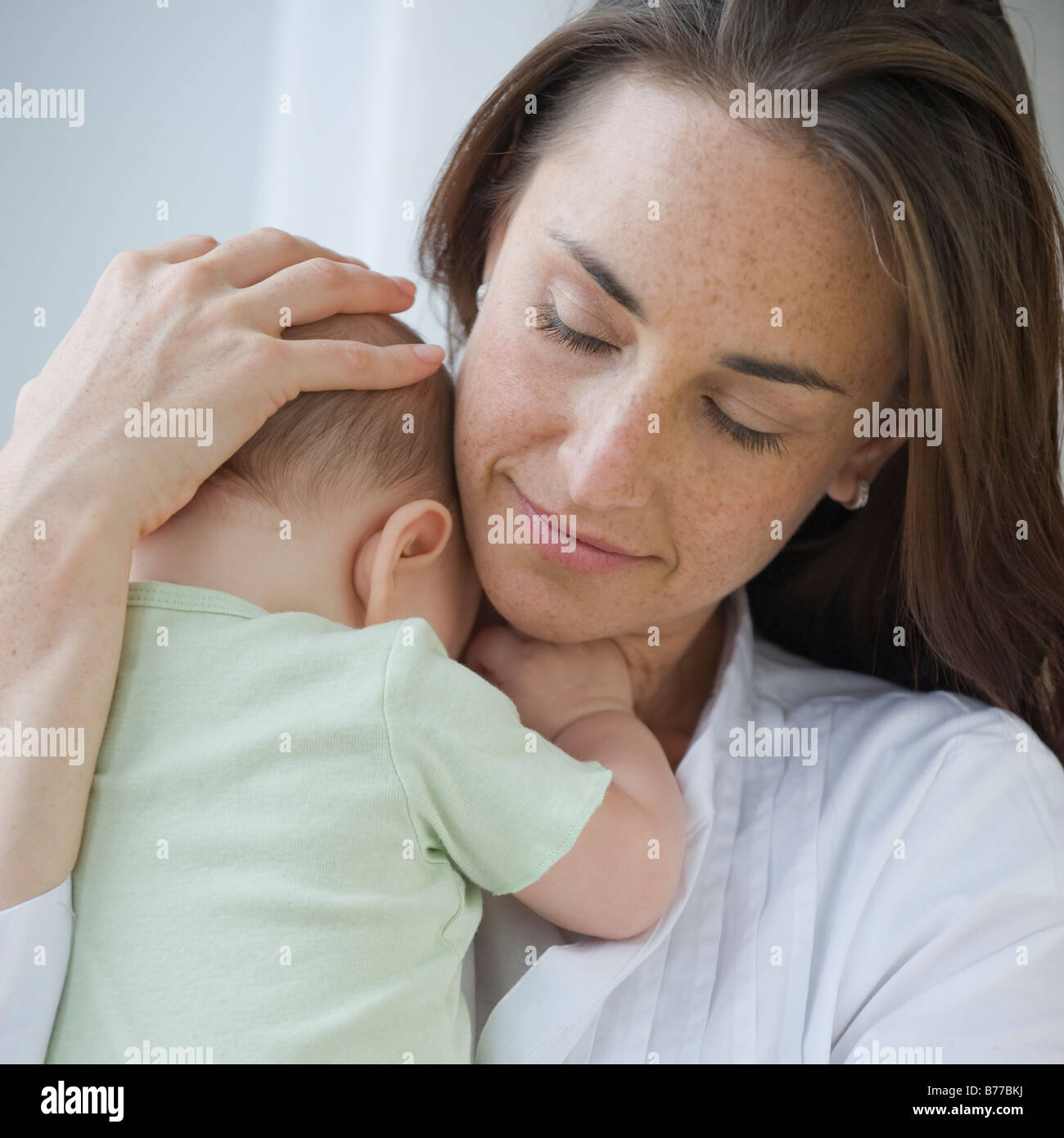 Woman protecting baby and rear view hi-res stock photography and images ...