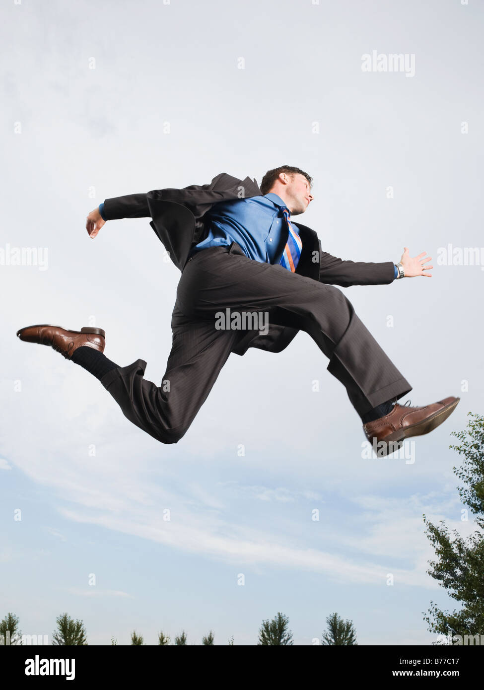 Power people energy body jumping hi-res stock photography and images ...