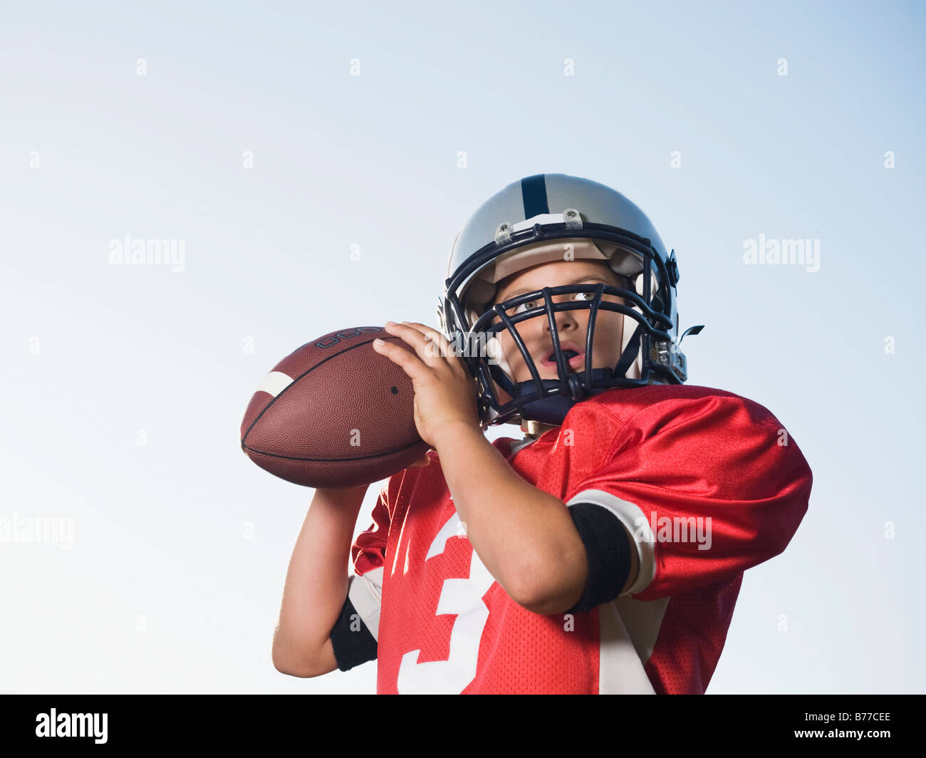 Football quarterback child not soccer hi-res stock photography and ...