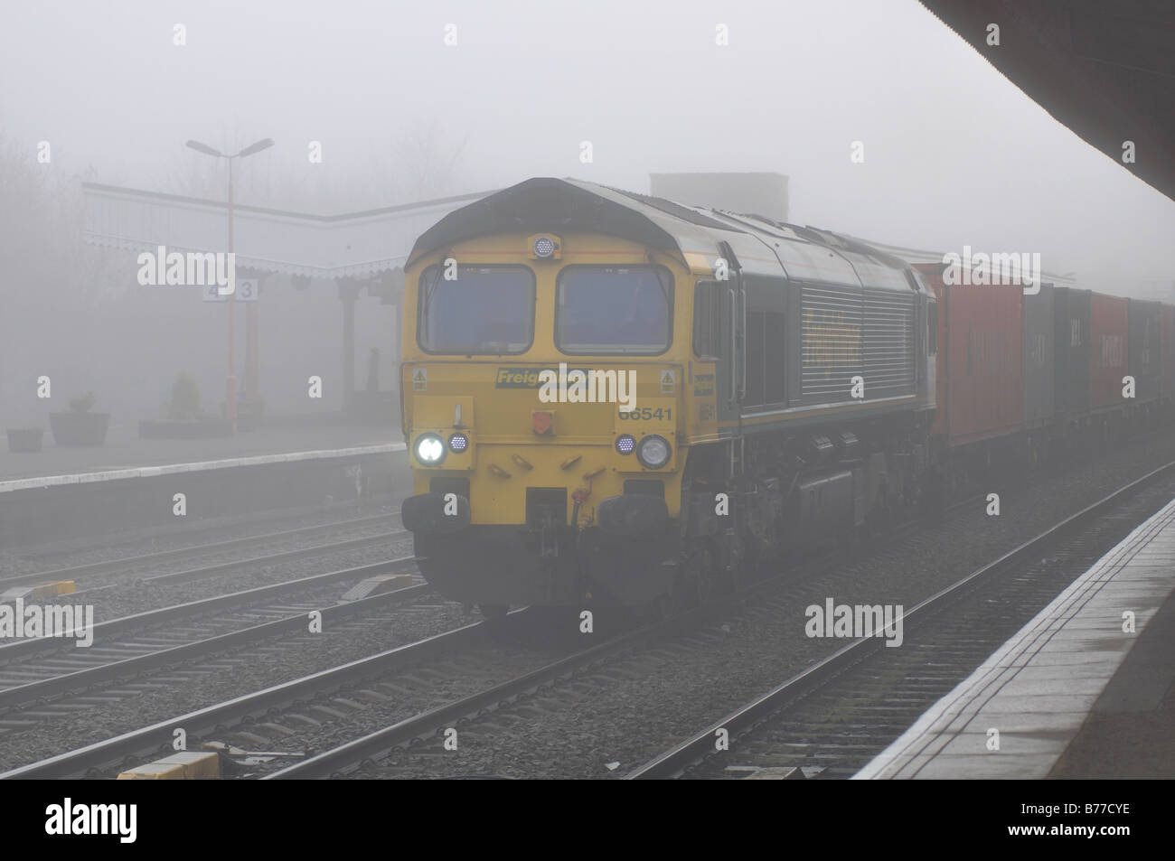 Freight passing through station hi-res stock photography and images - Alamy