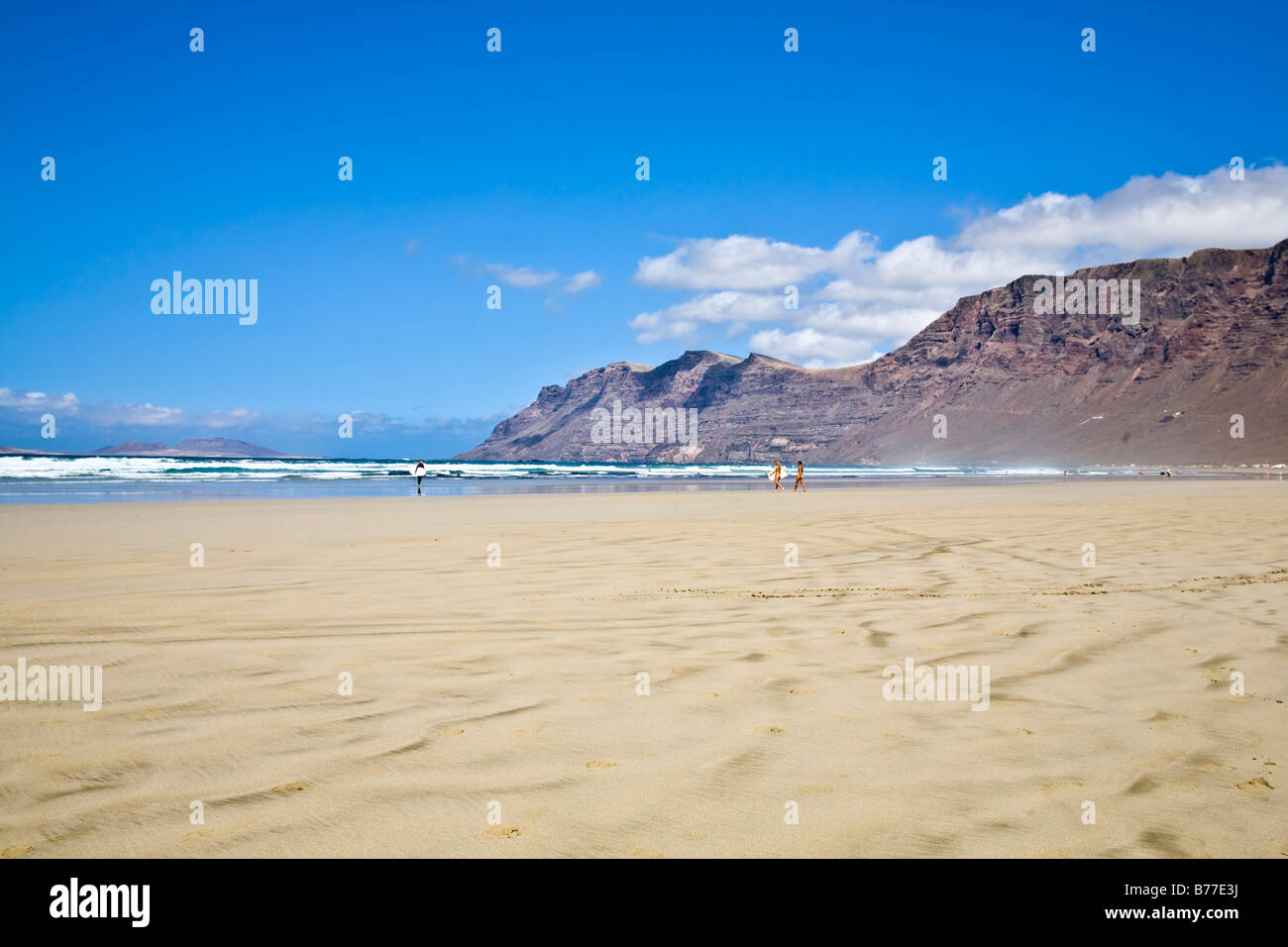 Playa de Famara risco de famara beach Mountain sand rocks reflection ...