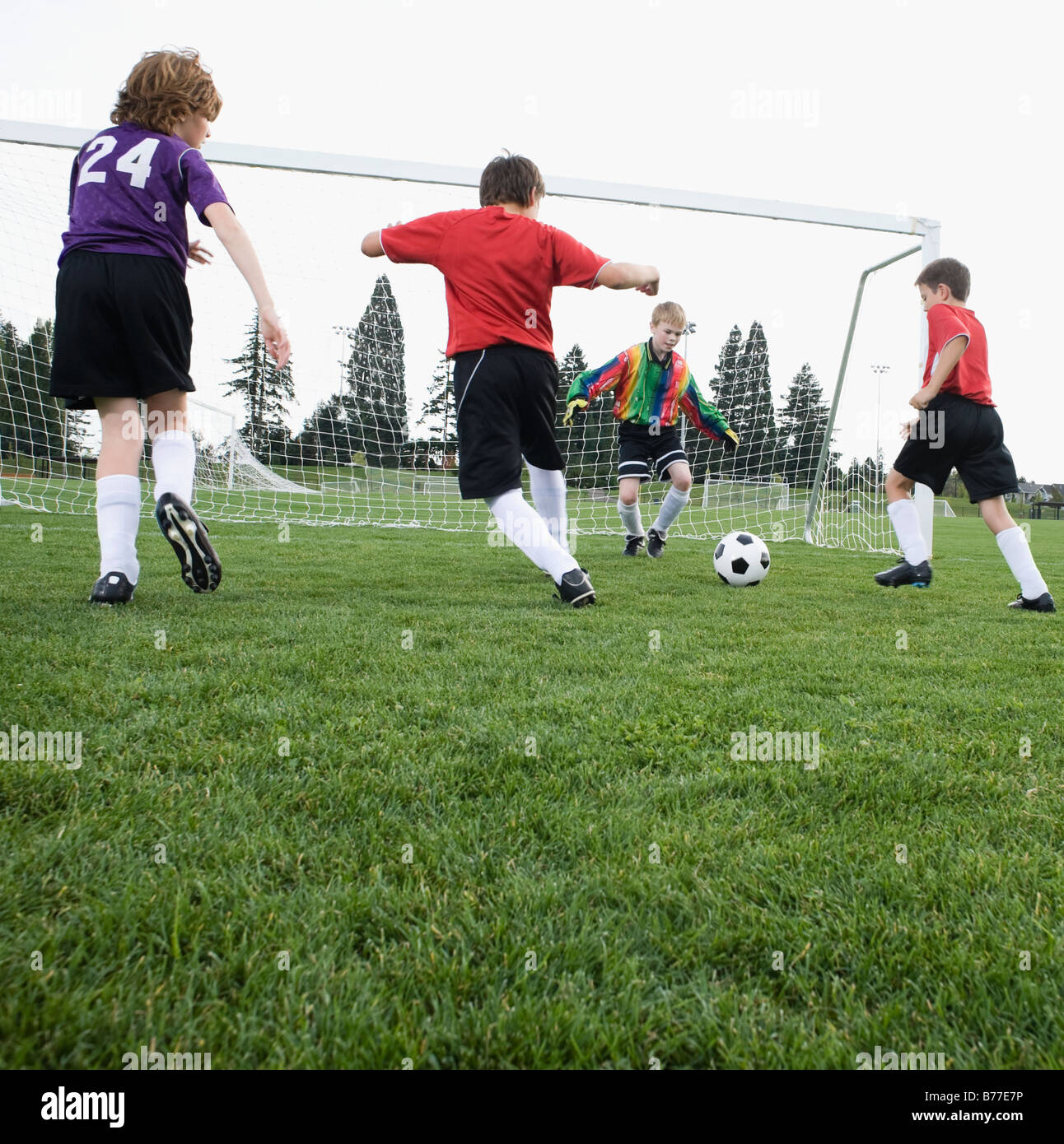 Boys playing competitive soccer Stock Photo - Alamy