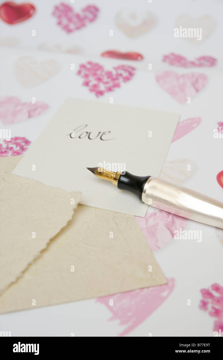 Writing a Valentine's Day card vertical Stock Photo - Alamy