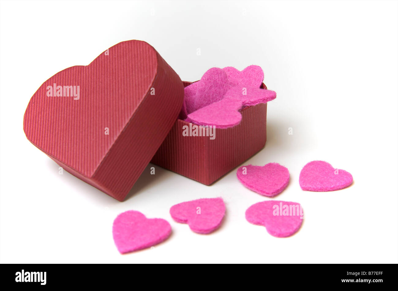 heart shaped gift box with little felt hearts Stock Photo - Alamy