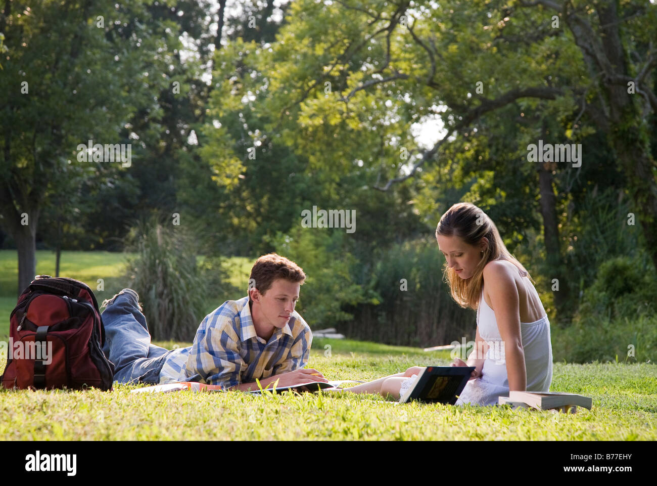 College students studying grass Stock Photo - Alamy
