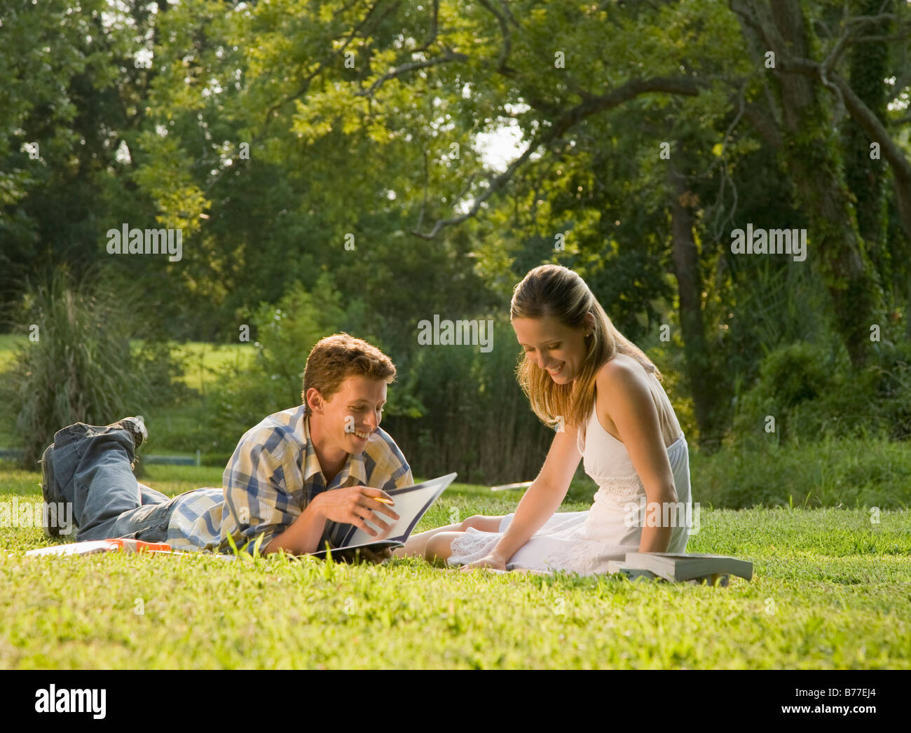 College students studying grass Stock Photo - Alamy