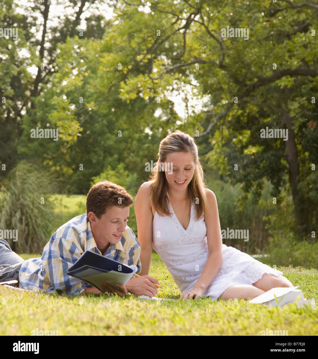College students studying grass Stock Photo - Alamy