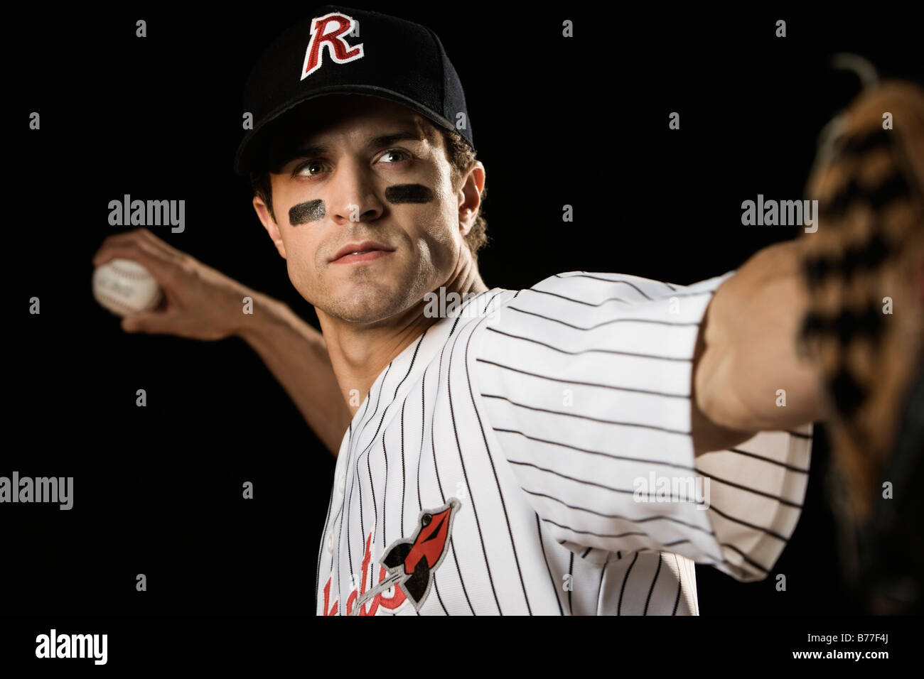 Close up of pitcher throwing baseball Stock Photo - Alamy