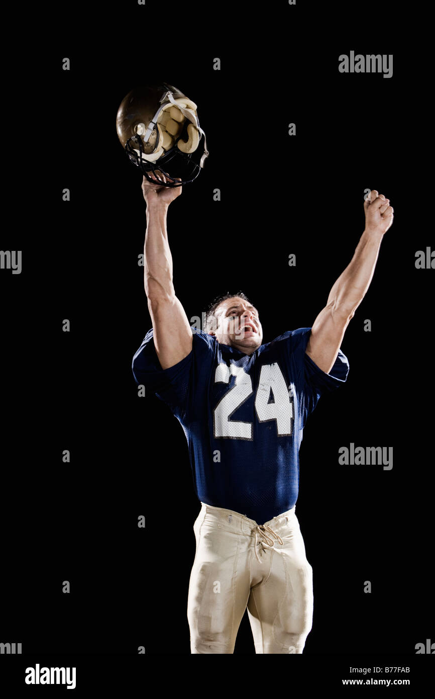 Football player celebrating Stock Photo - Alamy