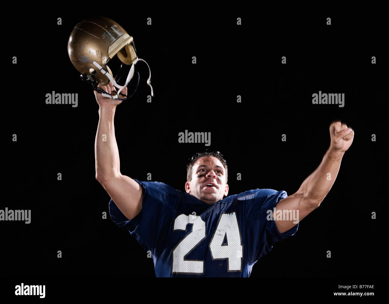 Football player celebrating Stock Photo - Alamy