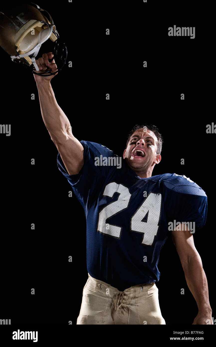 Football player celebrating Stock Photo - Alamy