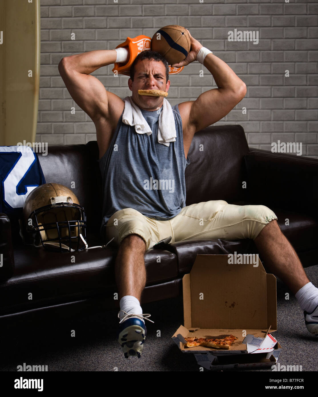 Football player pizza mouth looking frustrated Stock Photo - Alamy