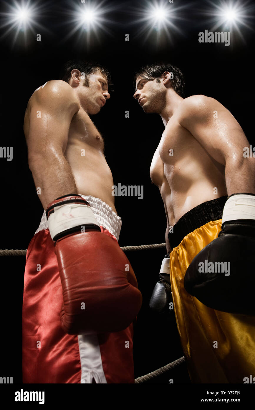 Boxers facing off boxing ring Stock Photo - Alamy