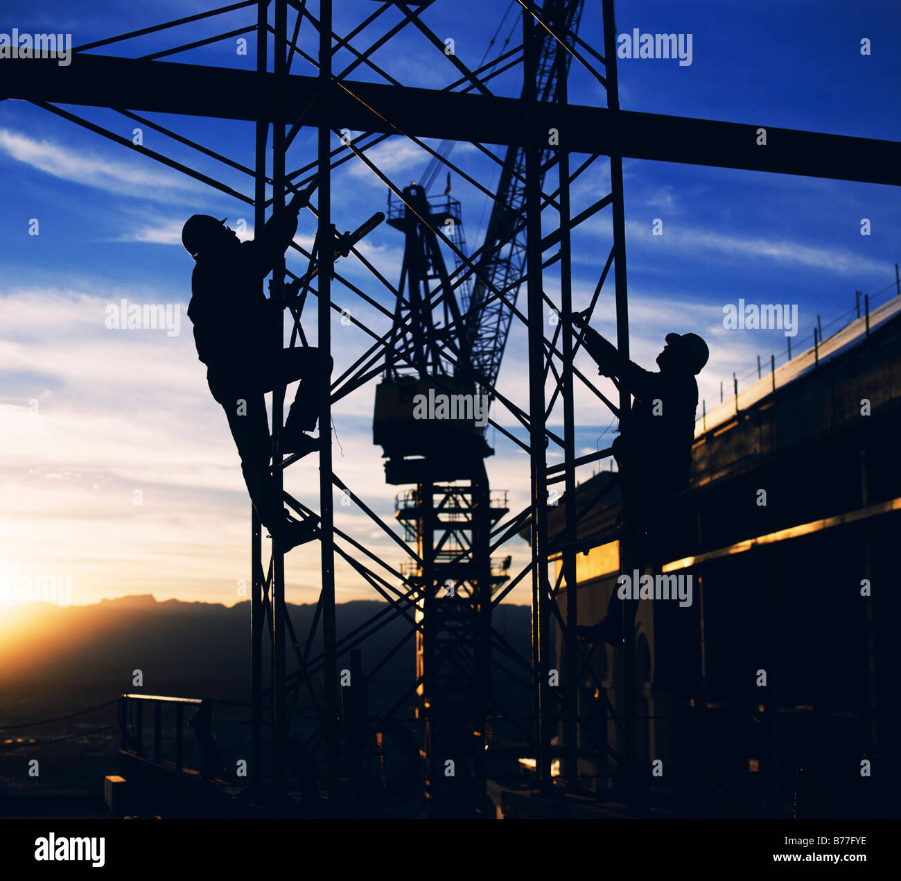 Workers climbing towers of construction site Las Vegas Stock Photo - Alamy