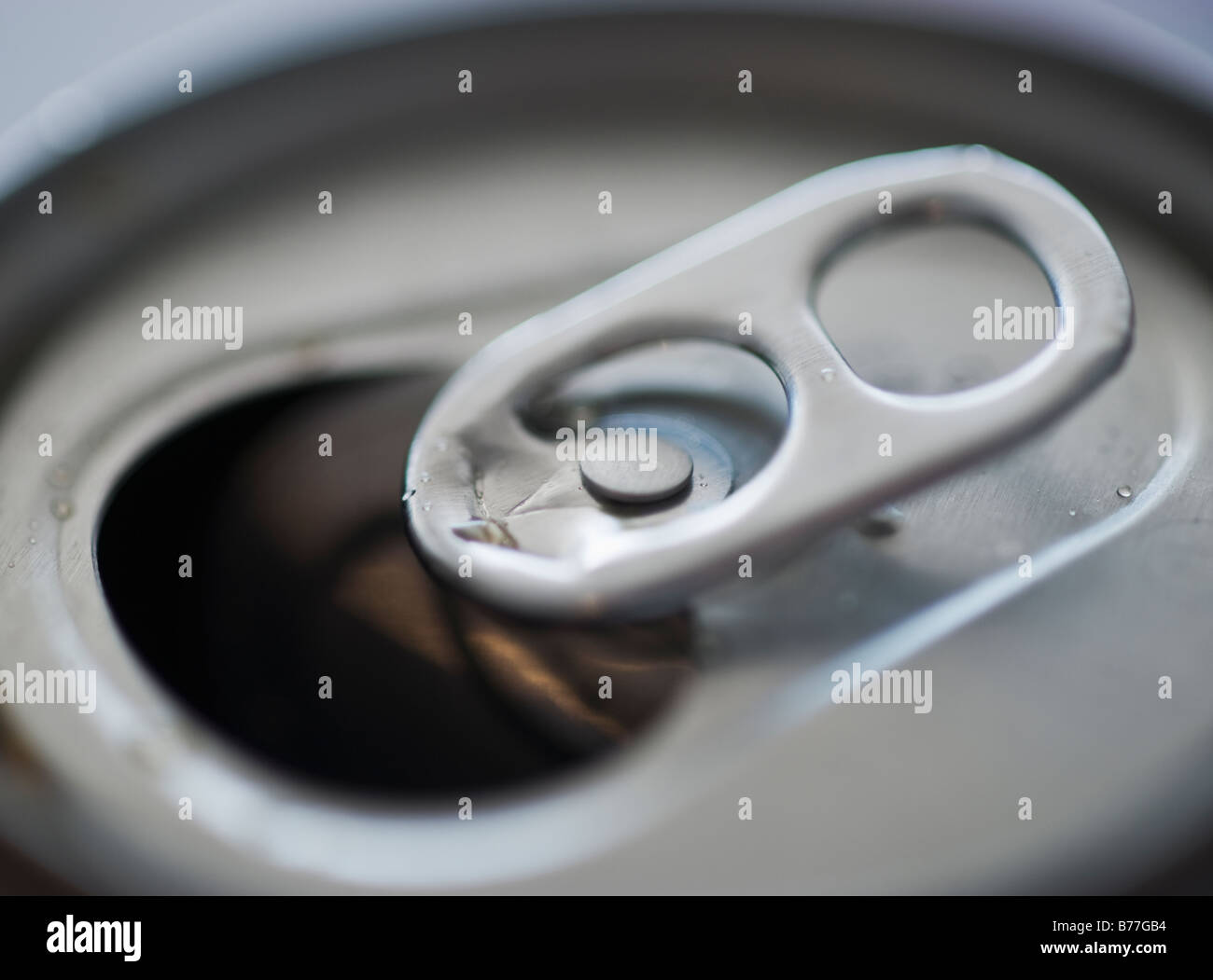 Close up of opening of tin can Stock Photo - Alamy