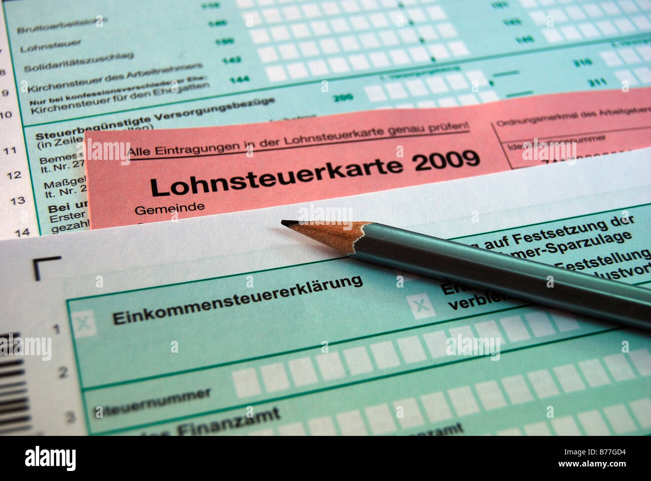 Wage tax card, tax forms and pencil Stock Photo - Alamy