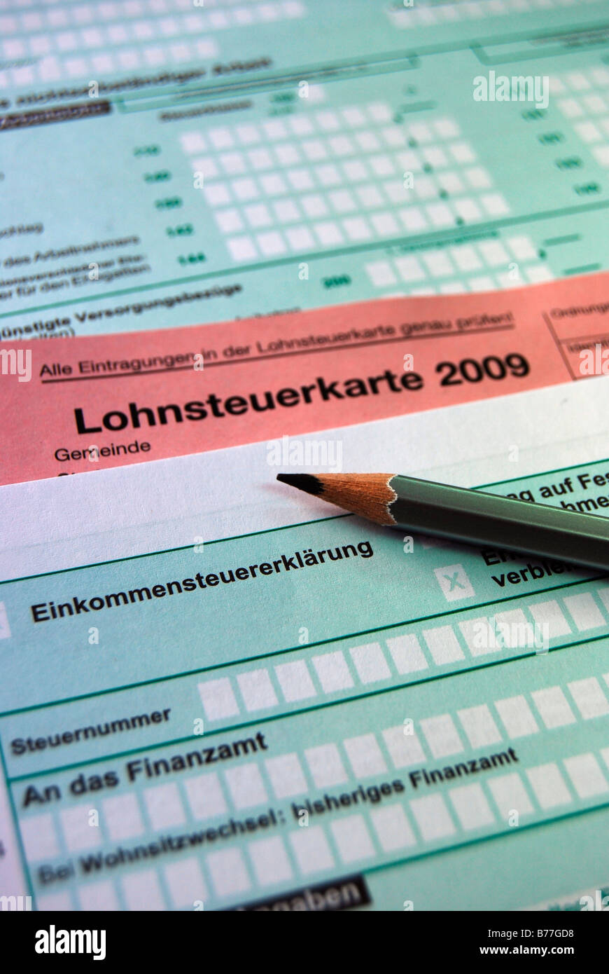 Wage tax card, tax forms and pencil Stock Photo - Alamy