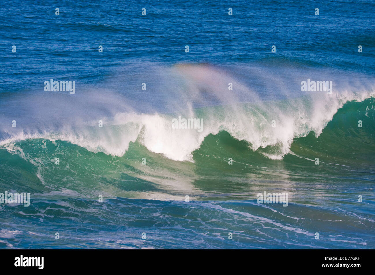 Waves and rainbow Stock Photo - Alamy