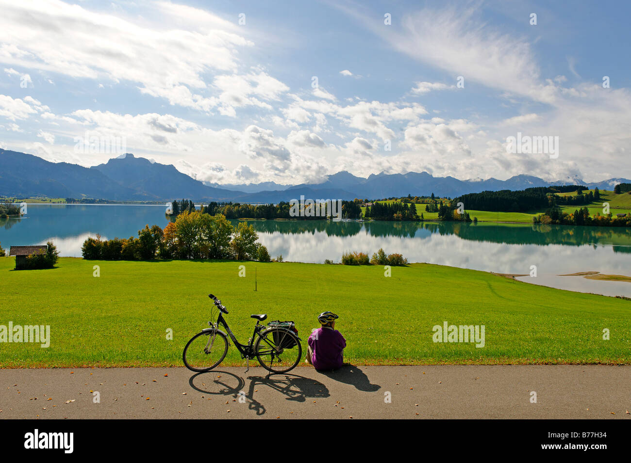 Biking at lake forggensee hi-res stock photography and images - Alamy