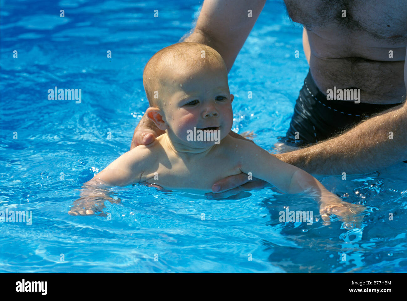 Lucas, boy, 9 month old, in a swimming pool Stock Photo - Alamy
