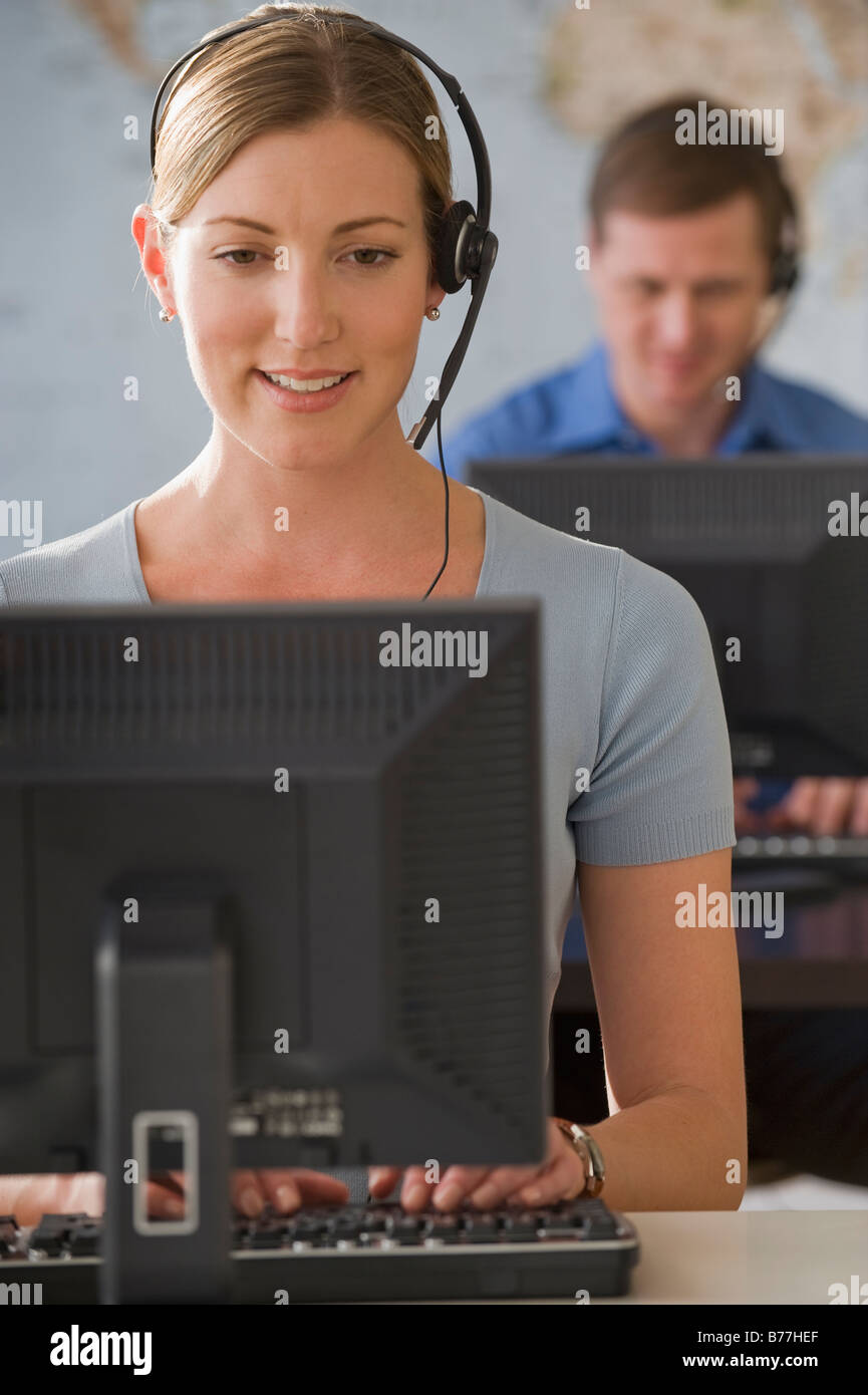 Call center employees working Stock Photo - Alamy