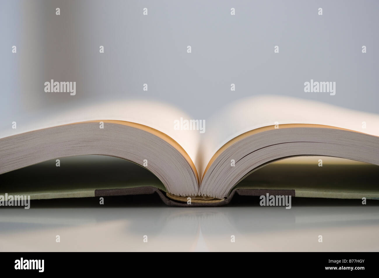 Close up of open book Stock Photo - Alamy