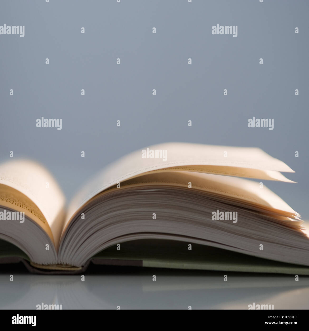 Close up of open book Stock Photo - Alamy