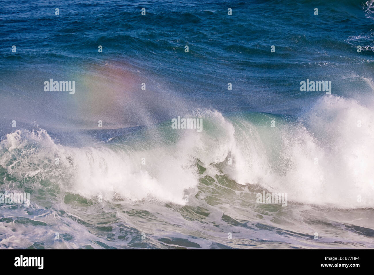 Waves and rainbow Stock Photo - Alamy