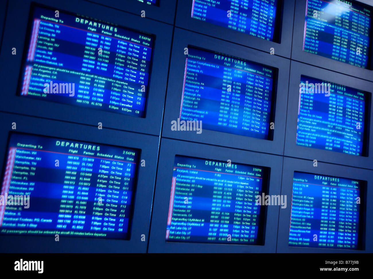 Airport departure information monitors hi-res stock photography and ...