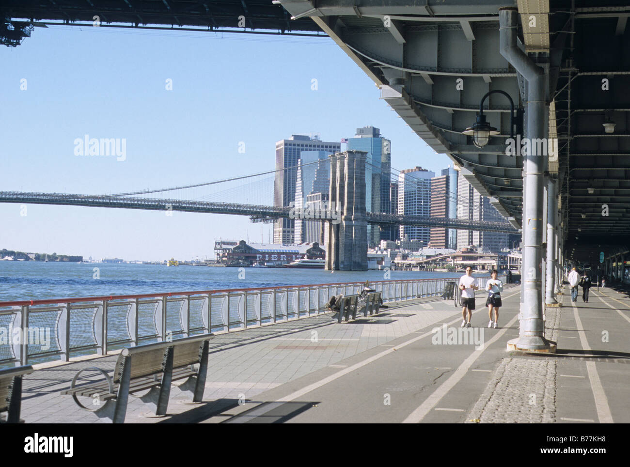 New York, riverside walk beneath South Street viaduct highway, north of ...